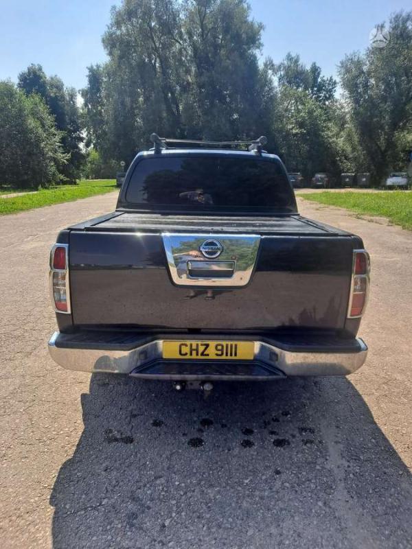 Black Nissan Navara 2008 in Panevezys, with an engine capacity of 0.00 L and mileage of 199 thousand km for 4500 €, photo 7 on AUTOMOTO.COM.LV