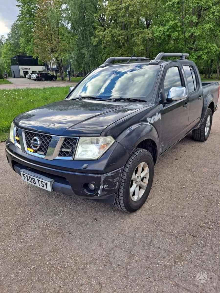 Black Nissan Navara 2008 in Panevezys, with an engine capacity of 2.50 L and mileage of 174 thousand km for 3600 €, photo 1 on AUTOMOTO.COM.LV