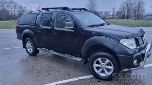 Black Nissan Navara 2009 in Aizkraukle, with an engine capacity of 2.50 L and mileage of 243 thousand km for 5900 €, photo  on AUTOMOTO.COM.LV