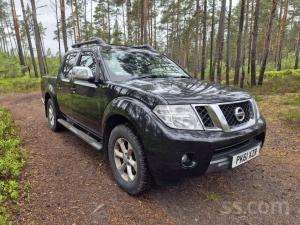 Melns Nissan Navara 2011 Rīga, ar dzinēja tilpumu 2.50 L un nobraukumu 200 tūkst. km par 4800 €, foto 1 vietnē AUTOMOTO.COM.LV
