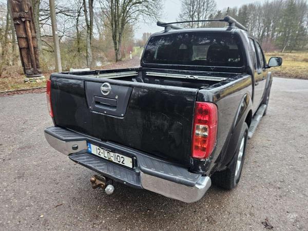 Black Nissan Navara 2012 in Telschi, with an engine capacity of 2.50 L and mileage of 176 thousand km for 4600 €, photo 6 on AUTOMOTO.COM.LV