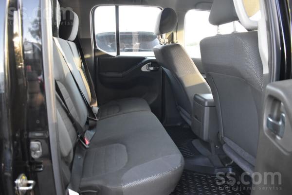 Black Nissan Navara 2012 in Kuldiga, with an engine capacity of 2.50 L and mileage of 0 thousand km for 9350 €, photo 6 on AUTOMOTO.COM.LV