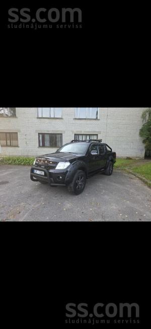Black Nissan Navara 2014 in Dobele, with an engine capacity of 2.50 L and mileage of 265 thousand km for 12999 €, photo 3 on AUTOMOTO.COM.LV