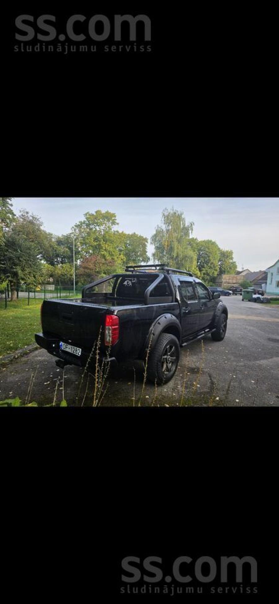 Black Nissan Navara 2014 in Dobele, with an engine capacity of 2.50 L and mileage of 265 thousand km for 12999 €, photo 5 on AUTOMOTO.COM.LV