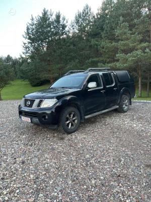 Black Nissan Navara 2015 in Vilnius, with an engine capacity of 2.49 L and mileage of 282 thousand km for 9800 €, photo  on AUTOMOTO.COM.LV