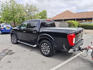 Black Nissan Navara 2016 in Jelgava, with an engine capacity of 2.30 L and mileage of 232 thousand km for 7800 €, photo 7 on AUTOMOTO.COM.LV