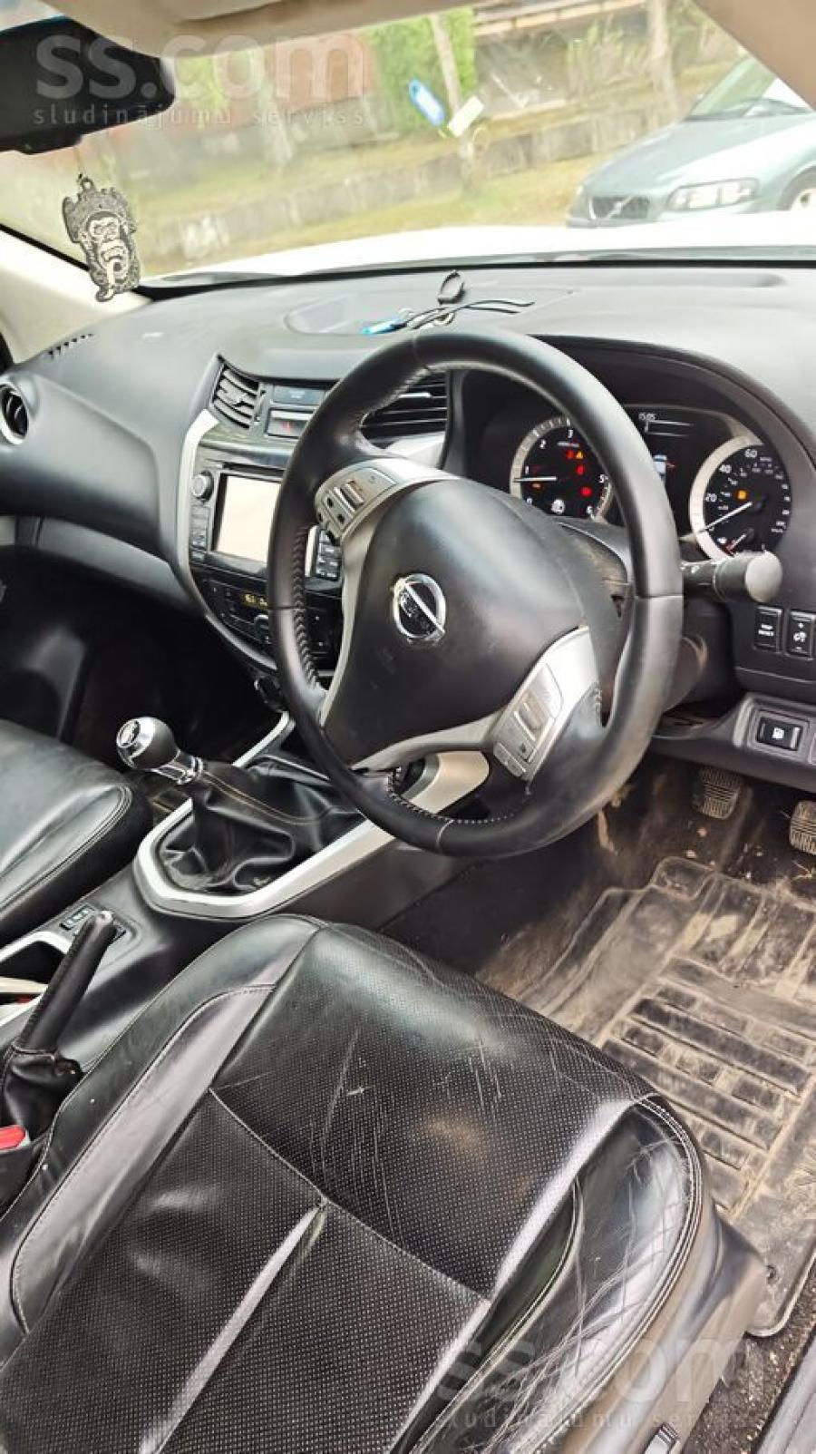 Black Nissan Navara 2016 in Jelgava, with an engine capacity of 2.30 L and mileage of 232 thousand km for 7800 €, photo 8 on AUTOMOTO.COM.LV