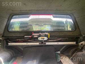 Black Nissan Navara 2016 in Talsi, with an engine capacity of 2.30 L and mileage of 192 thousand km for 16000 €, photo 12 on AUTOMOTO.COM.LV