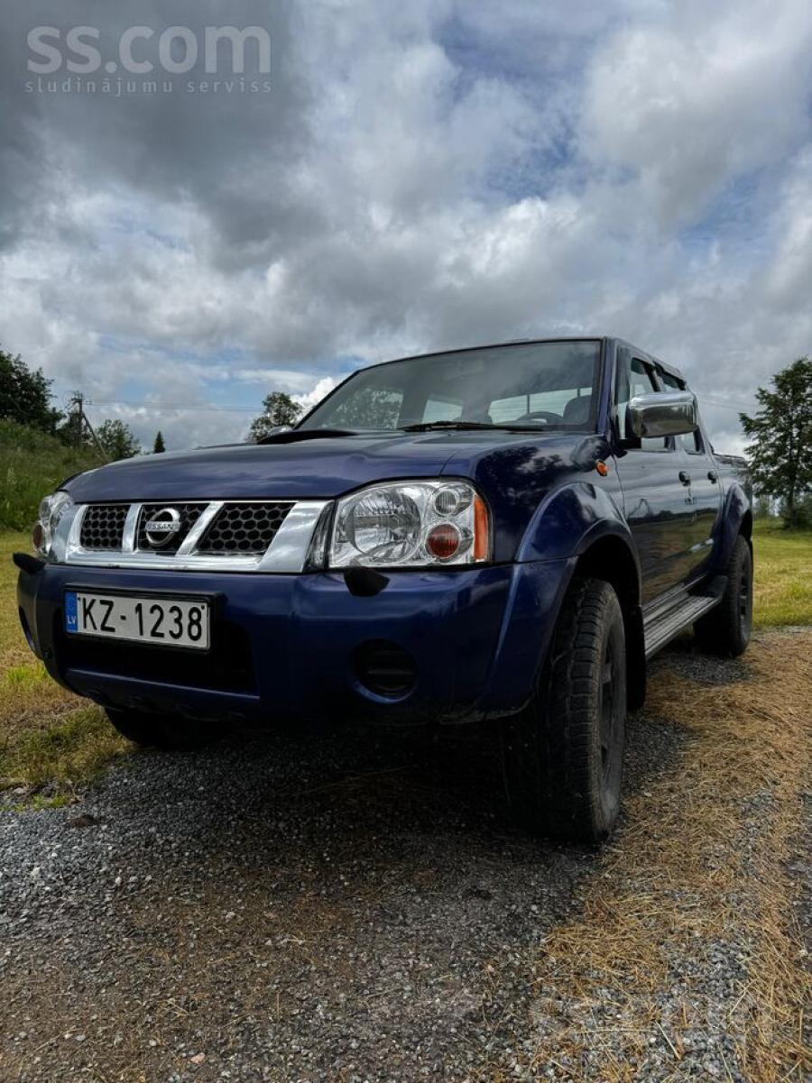 Zils Nissan Navara 2004 Rīga, ar dzinēja tilpumu 2.50 L un nobraukumu 323 tūkst. km par 4900 €, foto 4 vietnē AUTOMOTO.COM.LV