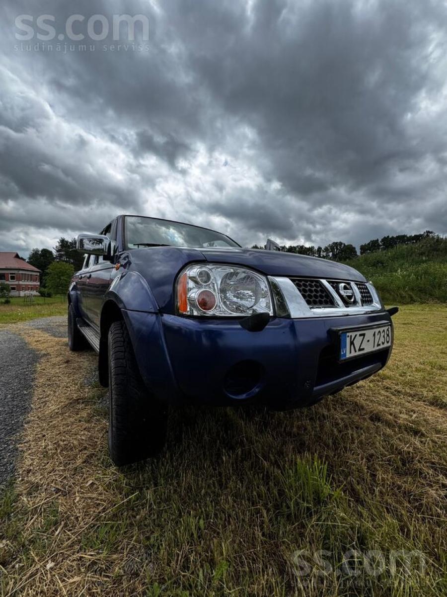 Zils Nissan Navara 2004 Rīga, ar dzinēja tilpumu 2.50 L un nobraukumu 323 tūkst. km par 4900 €, foto 5 vietnē AUTOMOTO.COM.LV