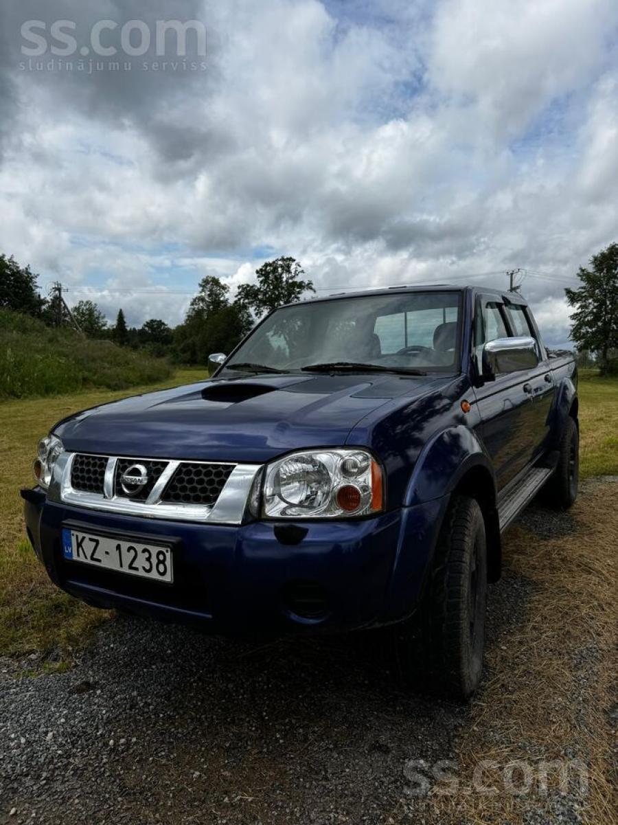 Zils Nissan Navara 2004 Rīga, ar dzinēja tilpumu 2.50 L un nobraukumu 323 tūkst. km par 4900 €, foto 8 vietnē AUTOMOTO.COM.LV