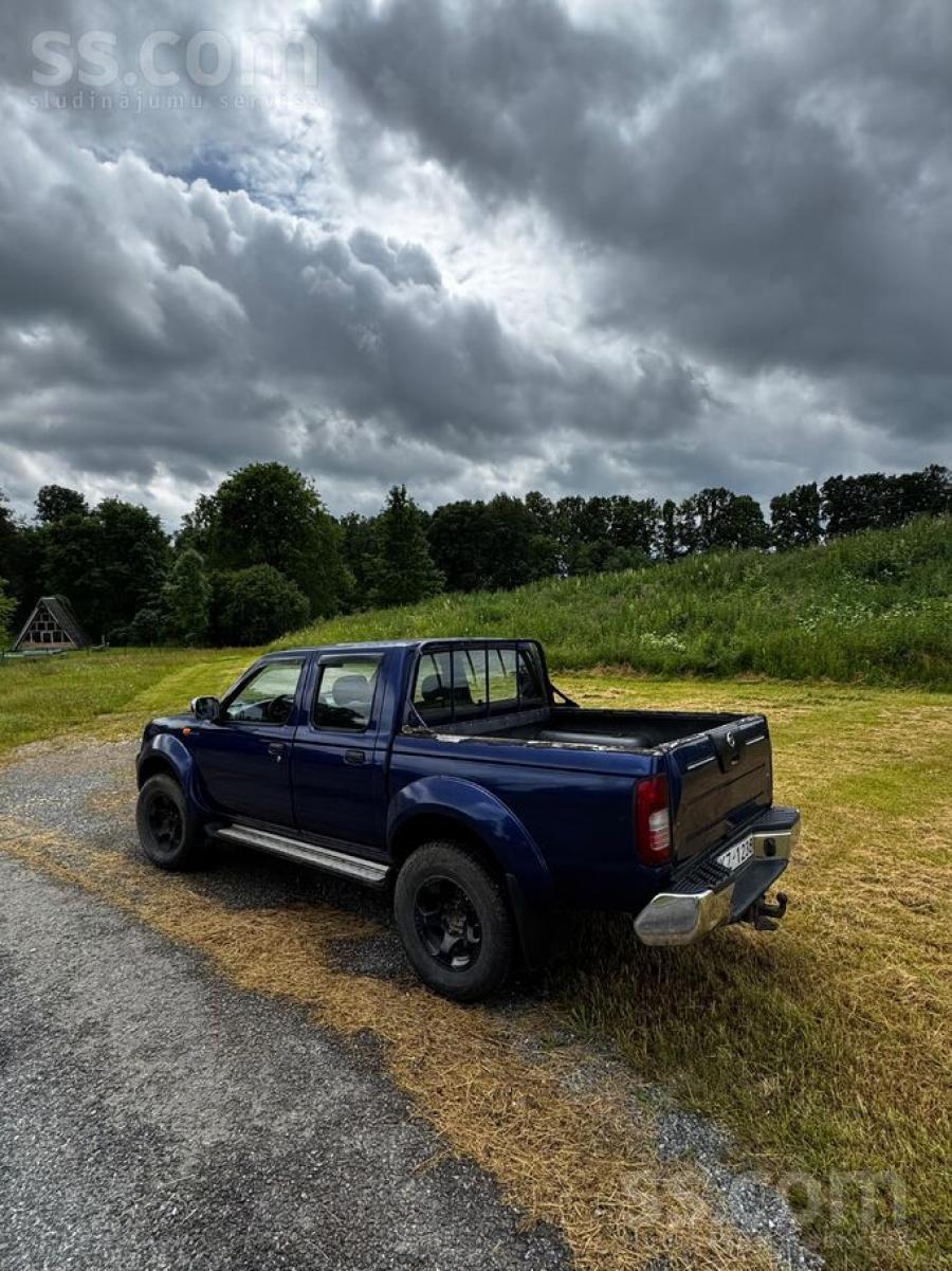Zils Nissan Navara 2004 Rīga, ar dzinēja tilpumu 2.50 L un nobraukumu 323 tūkst. km par 4900 €, foto 10 vietnē AUTOMOTO.COM.LV