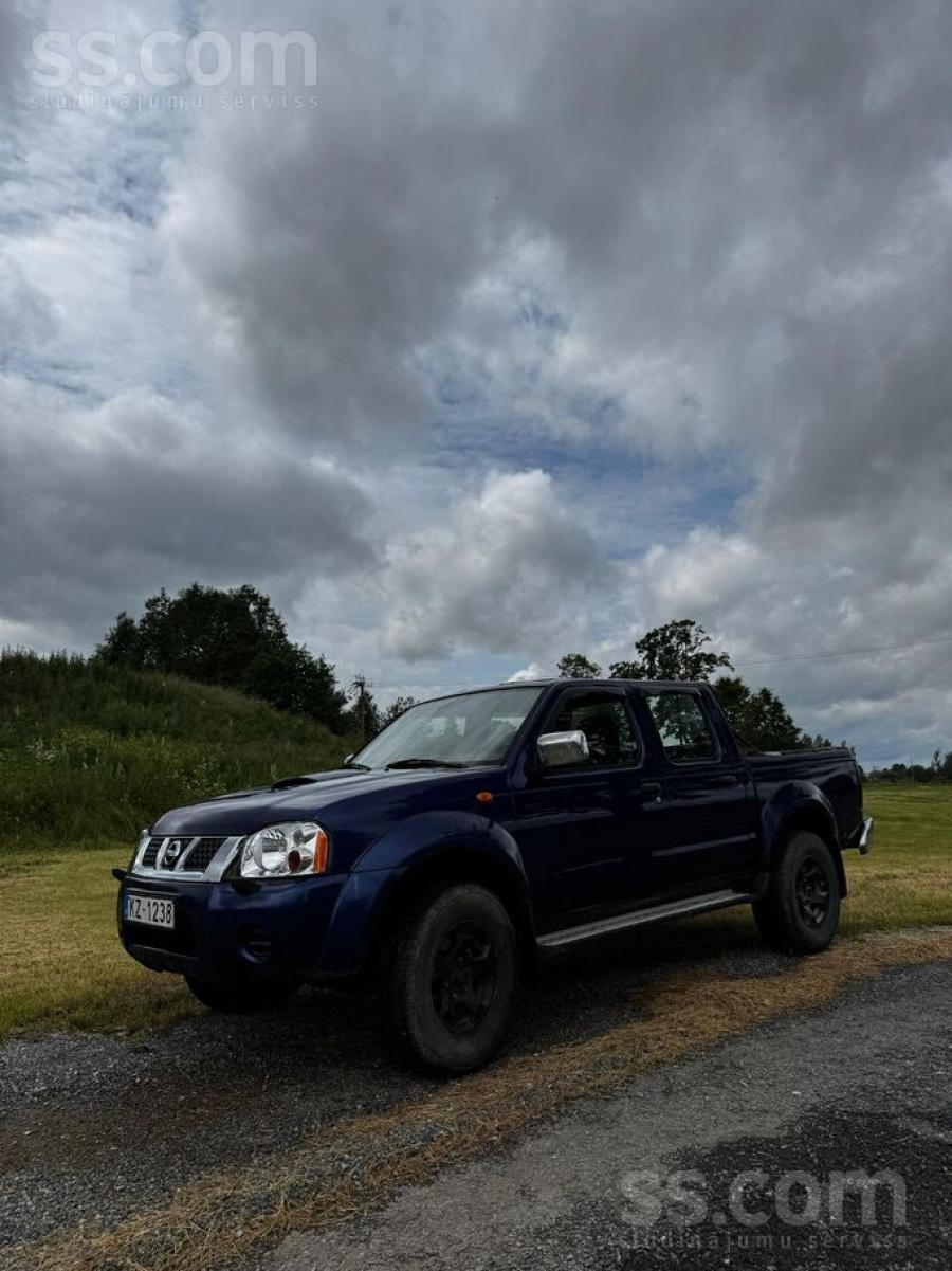 Zils Nissan Navara 2004 Rīga, ar dzinēja tilpumu 2.50 L un nobraukumu 323 tūkst. km par 4900 €, foto 11 vietnē AUTOMOTO.COM.LV