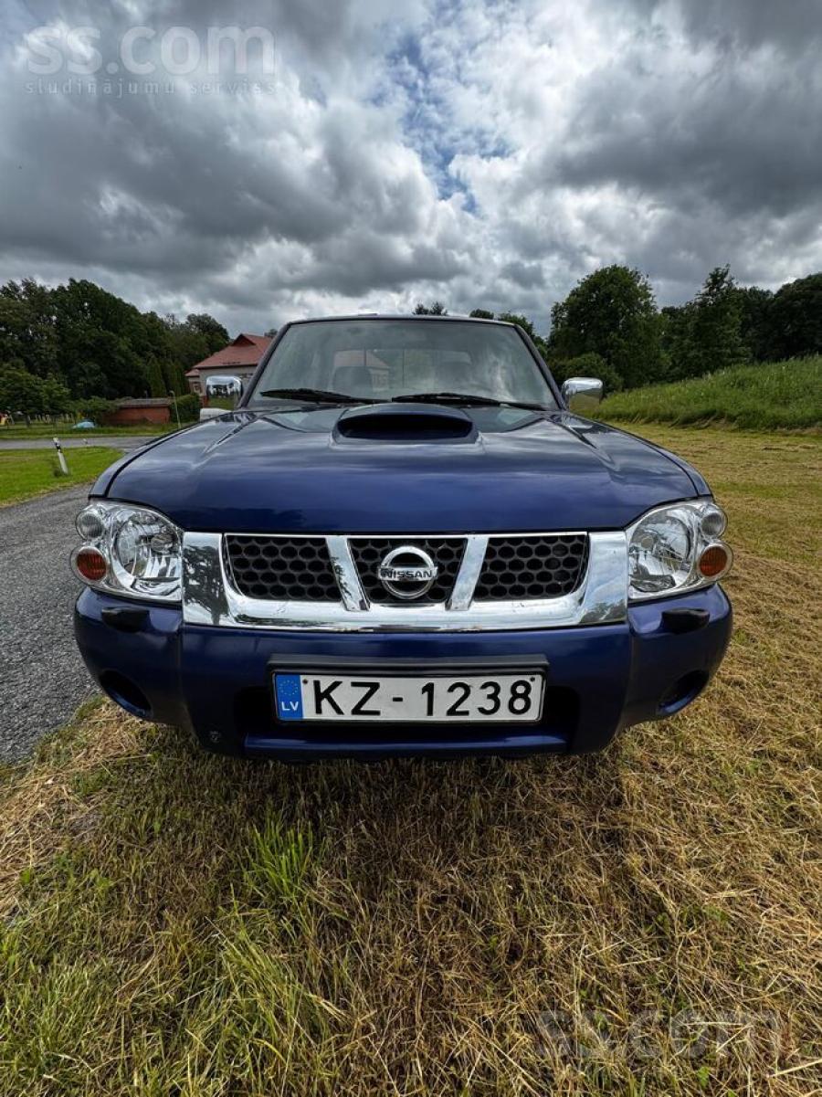 Zils Nissan Navara 2004 Rīga, ar dzinēja tilpumu 2.50 L un nobraukumu 323 tūkst. km par 4900 €, foto 12 vietnē AUTOMOTO.COM.LV