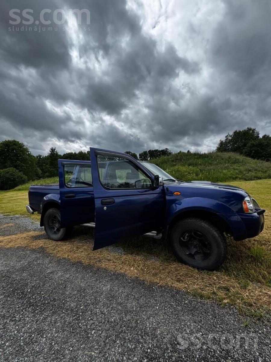 Zils Nissan Navara 2004 Rīga, ar dzinēja tilpumu 2.50 L un nobraukumu 323 tūkst. km par 4900 €, foto 15 vietnē AUTOMOTO.COM.LV