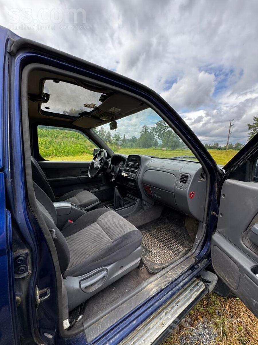 Zils Nissan Navara 2004 Rīga, ar dzinēja tilpumu 2.50 L un nobraukumu 323 tūkst. km par 4900 €, foto 20 vietnē AUTOMOTO.COM.LV