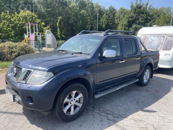 Blue Nissan Navara 2010 in Riga, with an engine capacity of 2.50 L and mileage of 250 thousand km for 4500 €, photo 3 on AUTOMOTO.COM.LV