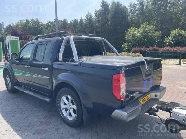 Blue Nissan Navara 2010 in Riga, with an engine capacity of 2.50 L and mileage of 250 thousand km for 4500 €, photo 4 on AUTOMOTO.COM.LV