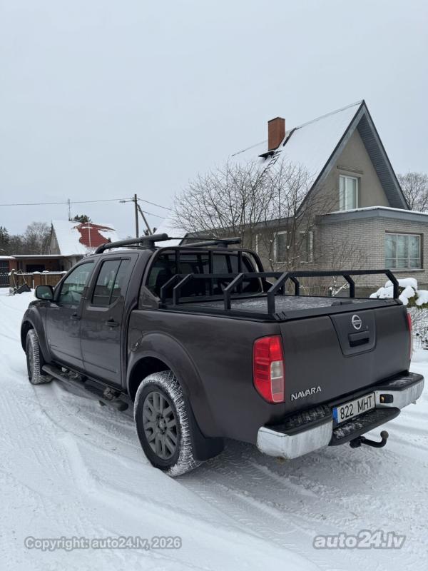Brown Nissan Navara 2012 in Tallinn, with an engine capacity of 3.00 L and mileage of 270 thousand km for 9999 €, photo 3 on AUTOMOTO.COM.LV