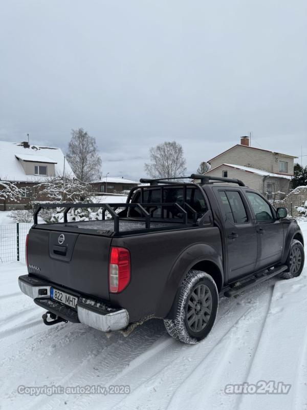 Brown Nissan Navara 2012 in Tallinn, with an engine capacity of 3.00 L and mileage of 270 thousand km for 9999 €, photo 4 on AUTOMOTO.COM.LV