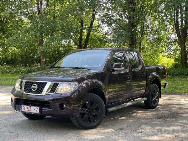 Brown Nissan Navara 2012 in Riga, with an engine capacity of 2.50 L and mileage of 205 thousand km for 7200 €, photo 1 on AUTOMOTO.COM.LV
