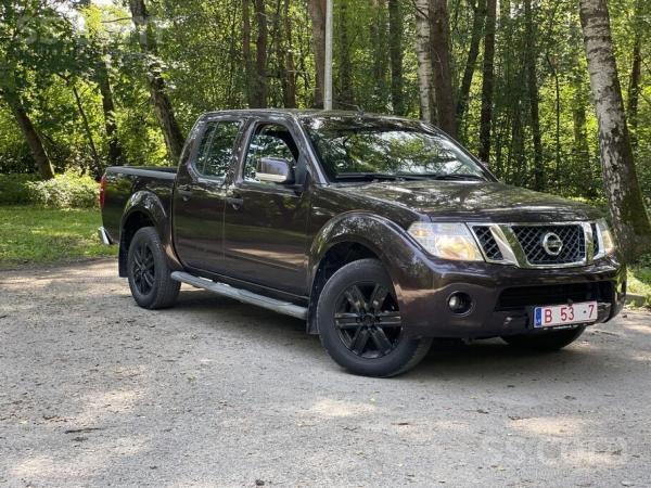 Brown Nissan Navara 2012 in Riga, with an engine capacity of 2.50 L and mileage of 205 thousand km for 7200 €, photo 2 on AUTOMOTO.COM.LV