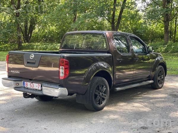 Brown Nissan Navara 2012 in Riga, with an engine capacity of 2.50 L and mileage of 205 thousand km for 7200 €, photo 4 on AUTOMOTO.COM.LV