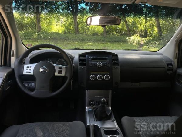 Brown Nissan Navara 2012 in Riga, with an engine capacity of 2.50 L and mileage of 205 thousand km for 7200 €, photo 7 on AUTOMOTO.COM.LV
