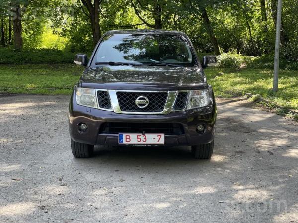 Brown Nissan Navara 2012 in Riga, with an engine capacity of 2.50 L and mileage of 205 thousand km for 7200 €, photo 3 on AUTOMOTO.COM.LV