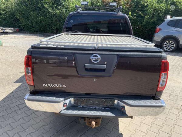 Brown Nissan Navara 2012 in Utena, with an engine capacity of 3.00 L and mileage of 250 thousand km for 6900 €, photo 5 on AUTOMOTO.COM.LV