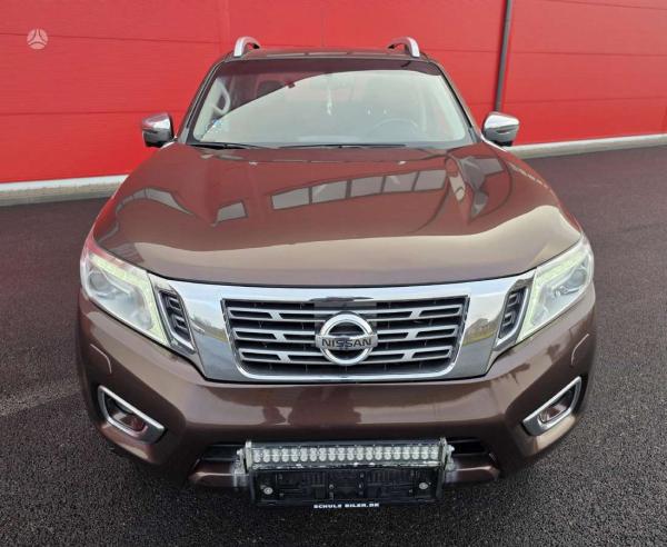 Brown Nissan Navara 2019 in Telschi, with an engine capacity of 2.30 L and mileage of 215 thousand km for 15800 €, photo 2 on AUTOMOTO.COM.LV