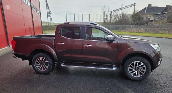 Brown Nissan Navara 2019 in Telschi, with an engine capacity of 2.30 L and mileage of 215 thousand km for 15800 €, photo 5 on AUTOMOTO.COM.LV