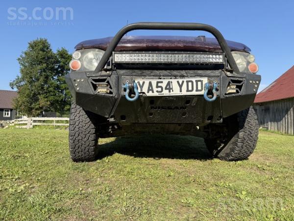 Brown Nissan Navara 2005 in Riga, with an engine capacity of 2.50 L and mileage of 170 thousand km for 6100 €, photo 4 on AUTOMOTO.COM.LV