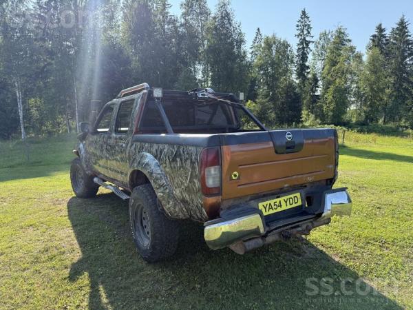 Brown Nissan Navara 2005 in Riga, with an engine capacity of 2.50 L and mileage of 170 thousand km for 6100 €, photo 5 on AUTOMOTO.COM.LV