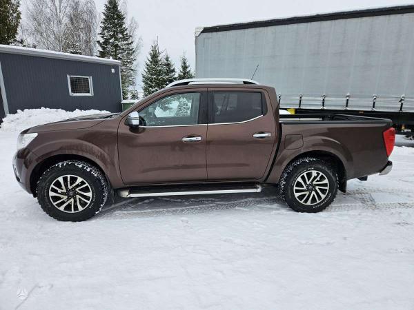 Brown Nissan Navara 2019 in Telschi, with an engine capacity of 2.30 L and mileage of 215 thousand km for 14600 €, photo 6 on AUTOMOTO.COM.LV