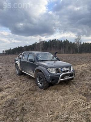 Grey Nissan Navara 2006 in Riga, with an engine capacity of 2.50 L and mileage of 326 thousand km for 5500 €, photo  on AUTOMOTO.COM.LV