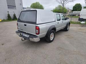 Grey Nissan Navara 2011 in Vilnius, with an engine capacity of 2.49 L and mileage of 215 thousand km for 5000 €, photo  on AUTOMOTO.COM.LV