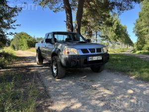 Grey Nissan Navara 2002 in Madona, with an engine capacity of 2.50 L and mileage of 165 thousand km for 5990 €, photo 3 on AUTOMOTO.COM.LV