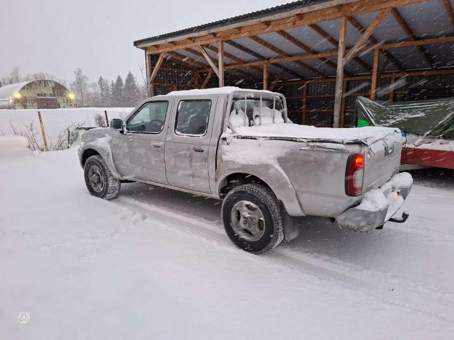 Pelēks Nissan Navara 2003 Panevēža, ar dzinēja tilpumu 2.49 L un nobraukumu 190 tūkst. km par 3900 €, foto 8 vietnē AUTOMOTO.COM.LV