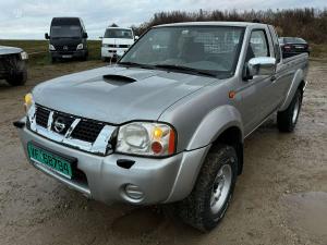 Grey Nissan Navara 2005 in Panevezys, with an engine capacity of 2.49 L and mileage of 205 thousand km for 3700 €, photo 1 on AUTOMOTO.COM.LV
