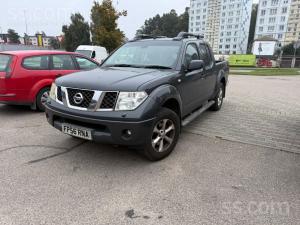 Grey Nissan Navara 2006 in Ogre, with an engine capacity of 2.50 L and mileage of 179 thousand km for 3750 €, photo 3 on AUTOMOTO.COM.LV