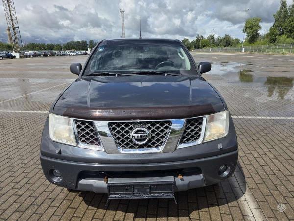 Grey Nissan Navara 2007 in Marijampole, with an engine capacity of 2.50 L and mileage of 270 thousand km for 2950 €, photo 2 on AUTOMOTO.COM.LV