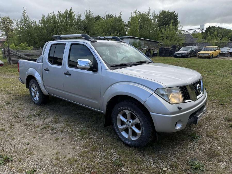 Pelēks Nissan Navara 2007 Pasvalys, ar dzinēja tilpumu 2.50 L un nobraukumu 265 tūkst. km par 4999 €, foto 1 vietnē AUTOMOTO.COM.LV