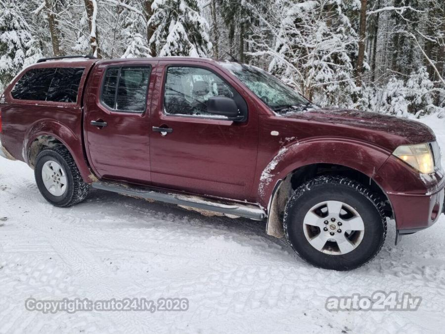 Red Nissan Navara 2007 in Otepaa, with an engine capacity of 2.50 L and mileage of 272 thousand km for 5750 €, photo 1 on AUTOMOTO.COM.LV