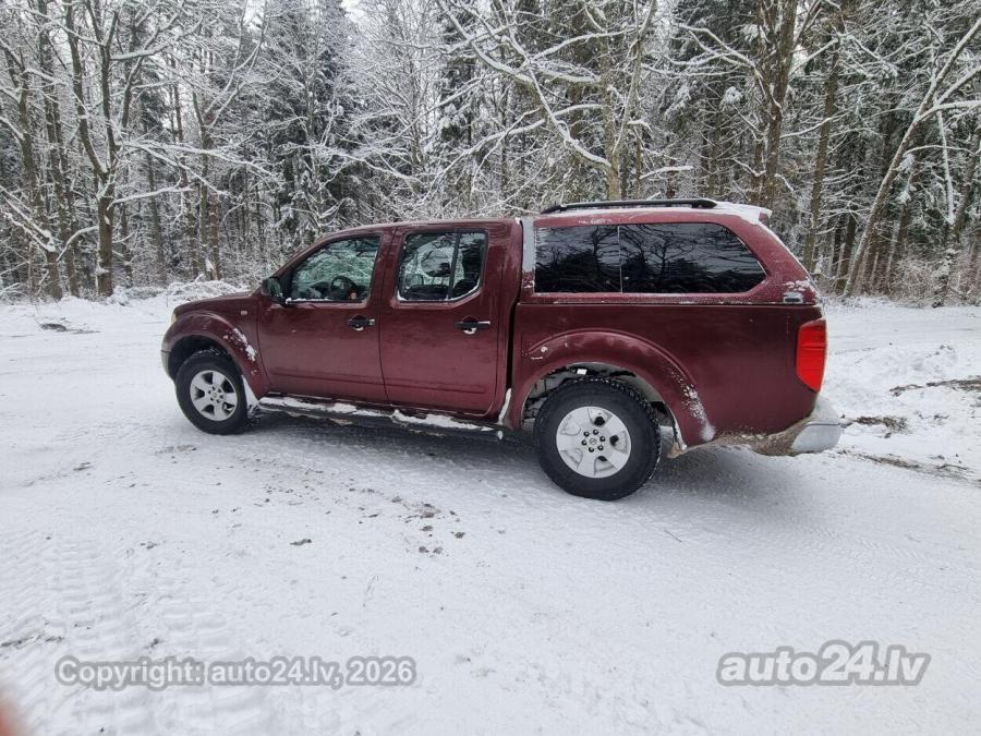 Red Nissan Navara 2007 in Otepaa, with an engine capacity of 2.50 L and mileage of 272 thousand km for 5750 €, photo 3 on AUTOMOTO.COM.LV