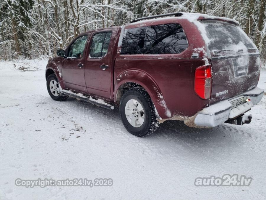 Red Nissan Navara 2007 in Otepaa, with an engine capacity of 2.50 L and mileage of 272 thousand km for 5750 €, photo 5 on AUTOMOTO.COM.LV