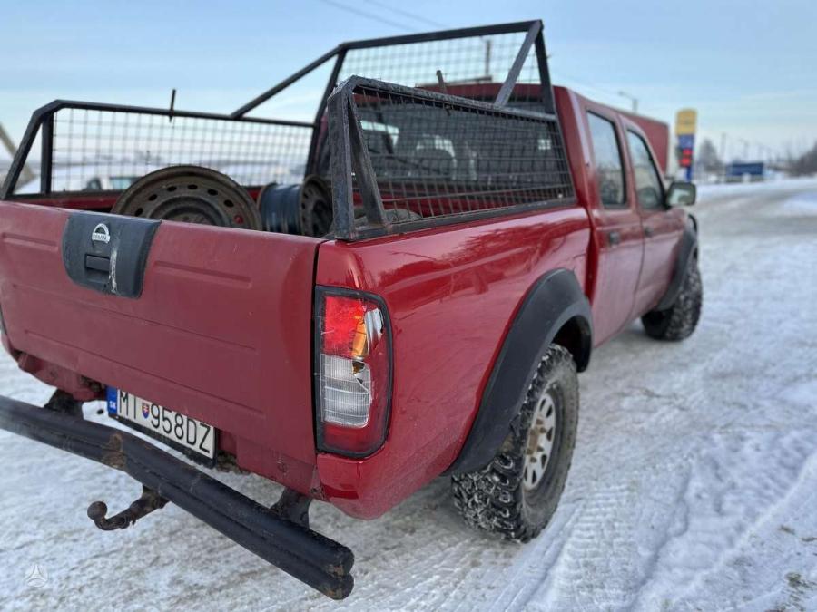 Sarkans Nissan Navara 2003 Marijampole, ar dzinēja tilpumu 2.49 L un nobraukumu 177 tūkst. km par 3699 €, foto 6 vietnē AUTOMOTO.COM.LV