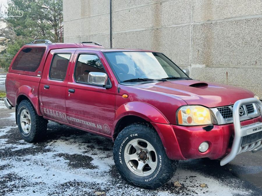 Sarkans Nissan Navara 2004 Druskininkai, ar dzinēja tilpumu 2.50 L un nobraukumu 298 tūkst. km par 3200 €, foto 2 vietnē AUTOMOTO.COM.LV