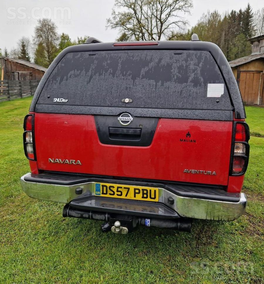Red Nissan Navara 2007 in Riga, with an engine capacity of 2.50 L and mileage of 243 thousand km for 3800 €, photo 1 on AUTOMOTO.COM.LV