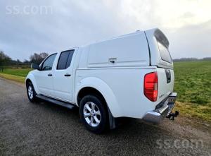 White Nissan Navara 2011 in Cesis, with an engine capacity of 2.50 L and mileage of 200 thousand km for 9600 €, photo 15 on AUTOMOTO.COM.LV